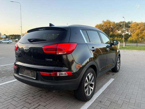 Melns Kia Sportage 2015 Tauragė, ar dzinēja tilpumu 1.69 L un nobraukumu 271 tūkst. km par 6700 €, foto 5 vietnē AUTOMOTO.COM.LV