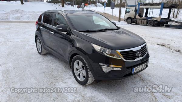 Black Kia Sportage 2012 in Tallinn, with an engine capacity of 2.00 L and mileage of 254 thousand km for 7800 €, photo 2 on AUTOMOTO.COM.LV