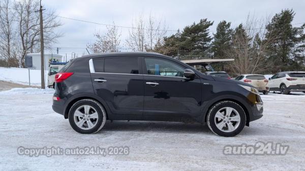 Black Kia Sportage 2012 in Tallinn, with an engine capacity of 2.00 L and mileage of 254 thousand km for 7800 €, photo 3 on AUTOMOTO.COM.LV