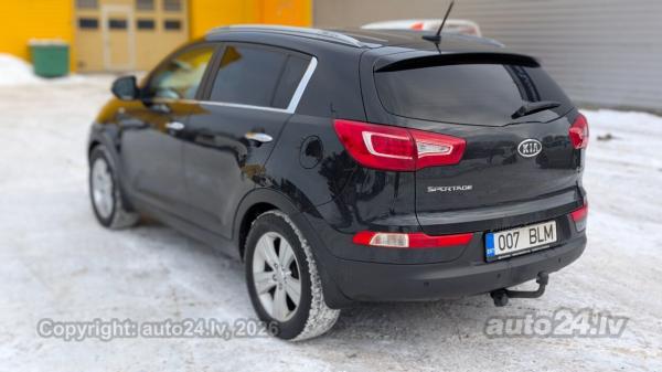 Black Kia Sportage 2012 in Tallinn, with an engine capacity of 2.00 L and mileage of 254 thousand km for 7800 €, photo 6 on AUTOMOTO.COM.LV