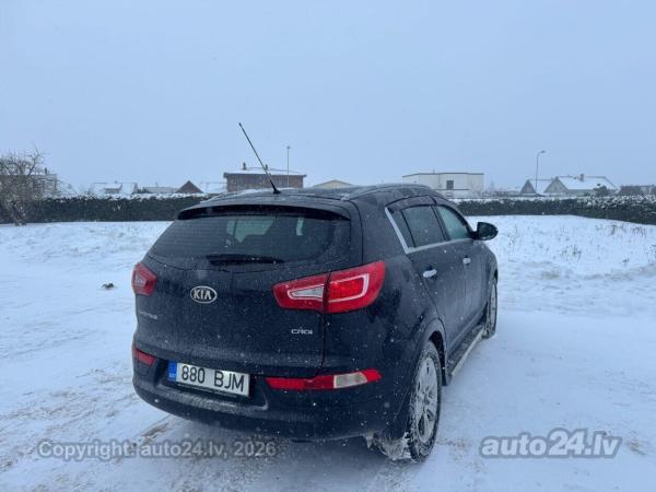 Black Kia Sportage 2013 in Tallinn, with an engine capacity of 2.00 L and mileage of 166 thousand km for 9500 €, photo 4 on AUTOMOTO.COM.LV