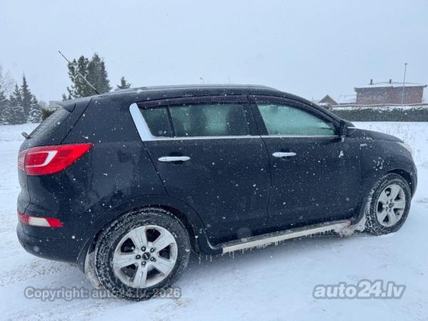 Black Kia Sportage 2013 in Tallinn, with an engine capacity of 2.00 L and mileage of 166 thousand km for 9500 €, photo 8 on AUTOMOTO.COM.LV
