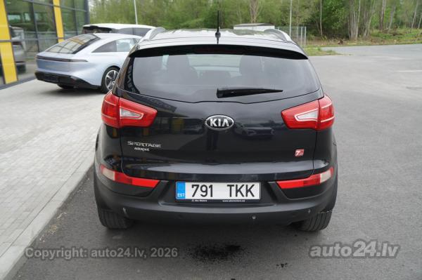 Melns Kia Sportage 2013 Tallina, ar dzinēja tilpumu 2.00 L un nobraukumu 294 tūkst. km par 4790 €, foto 5 vietnē AUTOMOTO.COM.LV