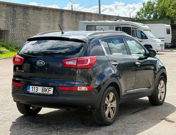 Melns Kia Sportage 2013 Narva, ar dzinēja tilpumu 1.60 L un nobraukumu 139 tūkst. km par 4999 €, foto 5 vietnē AUTOMOTO.COM.LV