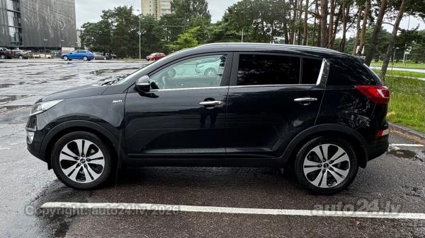 Black Kia Sportage 2013 in Tallinn, with an engine capacity of 2.00 L and mileage of 172 thousand km for 8999 €, photo 2 on AUTOMOTO.COM.LV