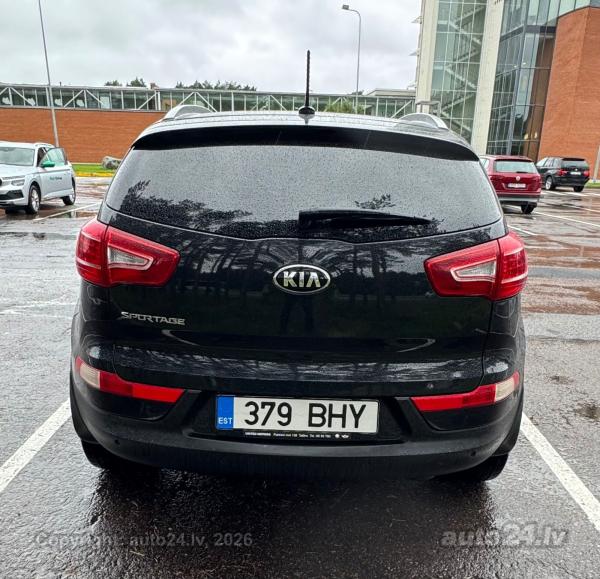 Black Kia Sportage 2013 in Tallinn, with an engine capacity of 2.00 L and mileage of 172 thousand km for 8999 €, photo 4 on AUTOMOTO.COM.LV