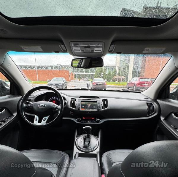 Black Kia Sportage 2013 in Tallinn, with an engine capacity of 2.00 L and mileage of 172 thousand km for 8999 €, photo 9 on AUTOMOTO.COM.LV