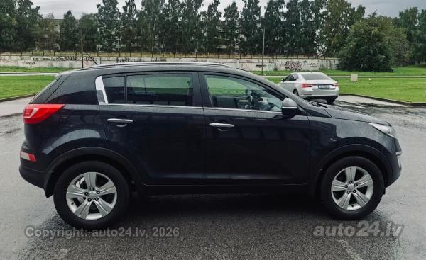 Black Kia Sportage 2013 in Tallinn, with an engine capacity of 2.00 L and mileage of 285 thousand km for 4790 €, photo 3 on AUTOMOTO.COM.LV