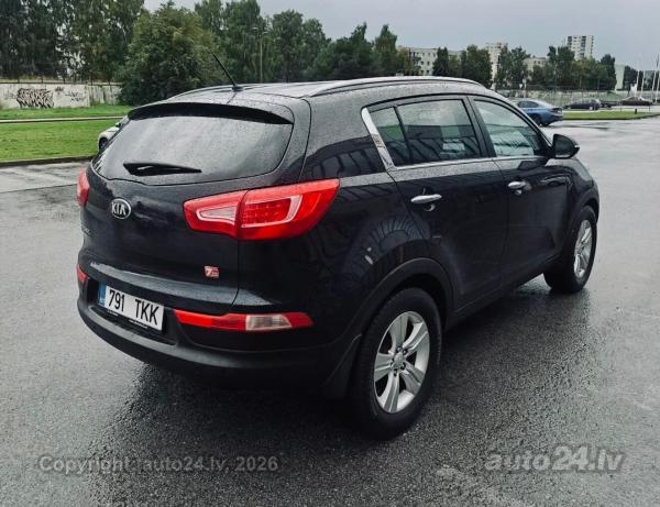 Black Kia Sportage 2013 in Tallinn, with an engine capacity of 2.00 L and mileage of 285 thousand km for 4790 €, photo 4 on AUTOMOTO.COM.LV