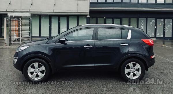Black Kia Sportage 2013 in Tallinn, with an engine capacity of 2.00 L and mileage of 285 thousand km for 4790 €, photo 6 on AUTOMOTO.COM.LV