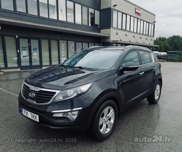 Black Kia Sportage 2013 in Tallinn, with an engine capacity of 2.00 L and mileage of 285 thousand km for 4790 €, photo 7 on AUTOMOTO.COM.LV