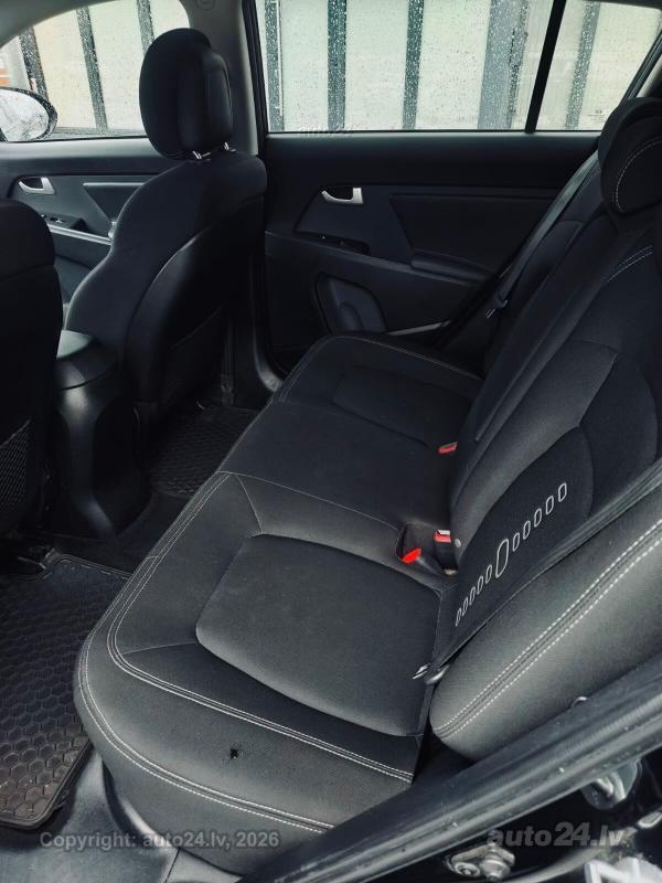 Black Kia Sportage 2013 in Tallinn, with an engine capacity of 2.00 L and mileage of 285 thousand km for 4790 €, photo 10 on AUTOMOTO.COM.LV