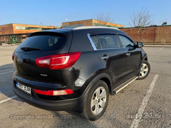 Black Kia Sportage 2013 in Tallinn, with an engine capacity of 2.00 L and mileage of 174 thousand km for 8499 €, photo 7 on AUTOMOTO.COM.LV