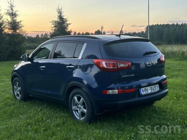 Blue Kia Sportage 2010 in Riga, with an engine capacity of 2.00 L and mileage of 365 thousand km for 5700 €, photo 1 on AUTOMOTO.COM.LV