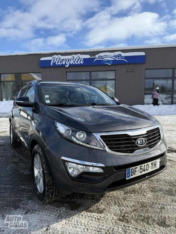 Blue Kia Sportage 2011 in Taurage, with an engine capacity of 1.70 L and mileage of 274 thousand km for 6000 €, photo 3 on AUTOMOTO.COM.LV