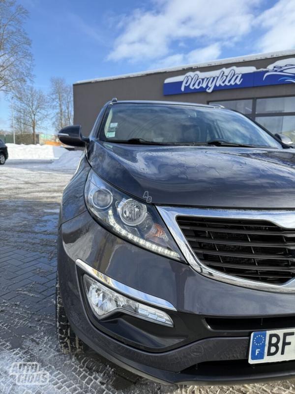 Blue Kia Sportage 2011 in Taurage, with an engine capacity of 1.70 L and mileage of 274 thousand km for 6000 €, photo 4 on AUTOMOTO.COM.LV
