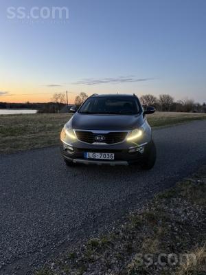 Blue Kia Sportage 2011 in Riga, with an engine capacity of 2.00 L and mileage of 220 thousand km for 7000 €, photo  on AUTOMOTO.COM.LV