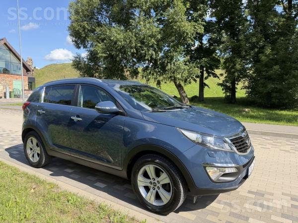 Blue Kia Sportage 2011 in Rezekne, with an engine capacity of 1.70 L and mileage of 0 thousand km for 6850 €, photo 5 on AUTOMOTO.COM.LV