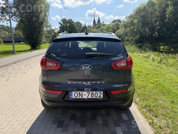 Blue Kia Sportage 2011 in Rezekne, with an engine capacity of 1.70 L and mileage of 0 thousand km for 6850 €, photo 8 on AUTOMOTO.COM.LV