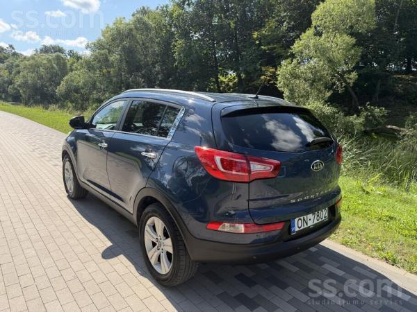 Blue Kia Sportage 2011 in Rezekne, with an engine capacity of 1.70 L and mileage of 0 thousand km for 6850 €, photo 10 on AUTOMOTO.COM.LV