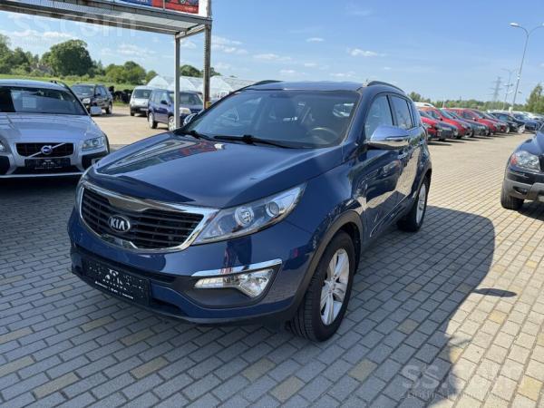 Blue Kia Sportage 2013 in Talsi, with an engine capacity of 1.70 L and mileage of 204 thousand km for 10970 €, photo 1 on AUTOMOTO.COM.LV