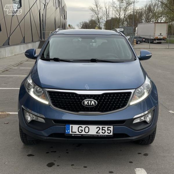 Blue Kia Sportage 2015 in Siauliai, with an engine capacity of 2.00 L and mileage of 260 thousand km for 6999 €, photo 2 on AUTOMOTO.COM.LV