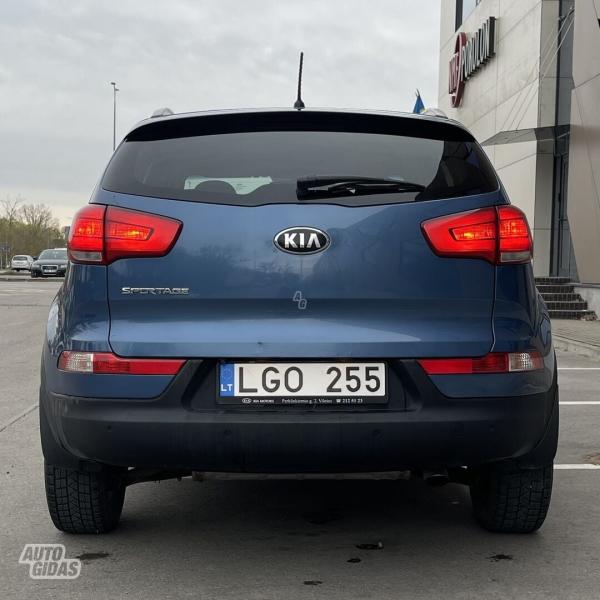 Blue Kia Sportage 2015 in Siauliai, with an engine capacity of 2.00 L and mileage of 260 thousand km for 6999 €, photo 5 on AUTOMOTO.COM.LV