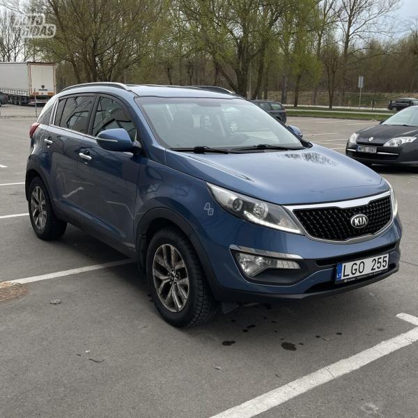 Blue Kia Sportage 2015 in Siauliai, with an engine capacity of 2.00 L and mileage of 260 thousand km for 6999 €, photo 8 on AUTOMOTO.COM.LV