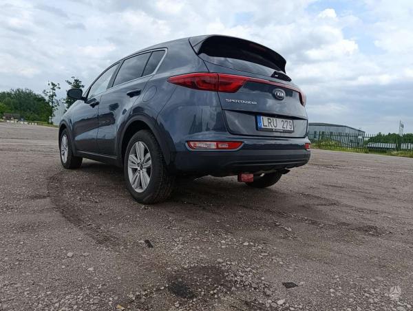 Blue Kia Sportage 2017 in Marijampole, with an engine capacity of 2.36 L and mileage of 250 thousand km for 9999 €, photo 5 on AUTOMOTO.COM.LV
