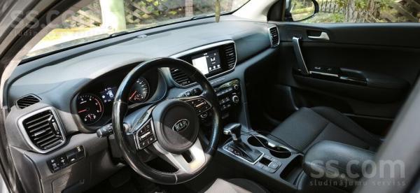 Blue Kia Sportage 2018 in Riga, with an engine capacity of 1.60 L and mileage of 117 thousand km for 13500 €, photo 5 on AUTOMOTO.COM.LV