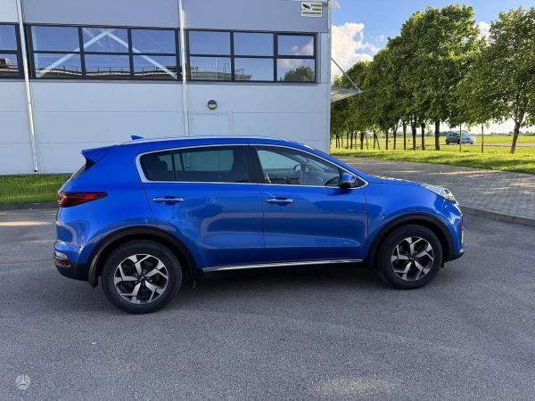 Blue Kia Sportage 2021 in Kaunas, with an engine capacity of 1.59 L and mileage of 90 thousand km for 18000 €, photo 3 on AUTOMOTO.COM.LV