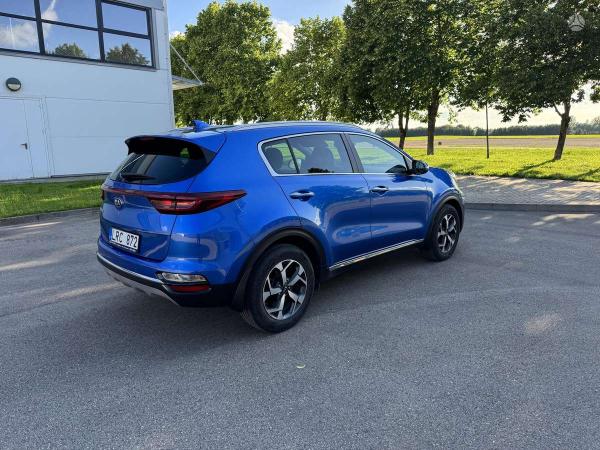 Blue Kia Sportage 2021 in Kaunas, with an engine capacity of 1.59 L and mileage of 90 thousand km for 18000 €, photo 4 on AUTOMOTO.COM.LV