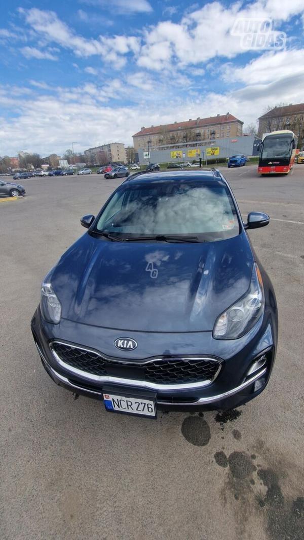 Blue Kia Sportage 2022 in Vilnius, with an engine capacity of 2.40 L and mileage of 124 thousand km for 18900 €, photo 8 on AUTOMOTO.COM.LV