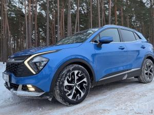 Blue Kia Sportage 2023 in Riga, with an engine capacity of 1.60 L and mileage of 84 thousand km for 22800 €, photo  on AUTOMOTO.COM.LV