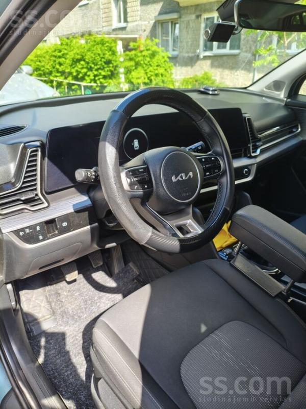 Blue Kia Sportage 2023 in Daugavpils, with an engine capacity of 1.60 L and mileage of 30 thousand km for 24000 €, photo 9 on AUTOMOTO.COM.LV