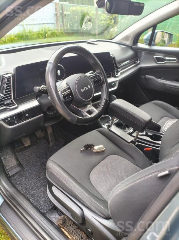 Zils Kia Sportage 2023 Daugavpils, ar dzinēja tilpumu 1.60 L un nobraukumu 31 tūkst. km par 24200 €, foto 8 vietnē AUTOMOTO.COM.LV