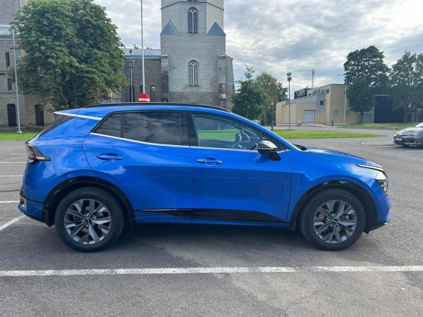 Blue Kia Sportage 2024 in Narva, with an engine capacity of 0.00 L and mileage of 90 thousand km for 28000 €, photo 3 on AUTOMOTO.COM.LV