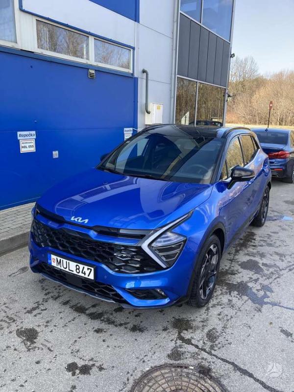 Blue Kia Sportage 2024 in Vilnius, with an engine capacity of 1.60 L and mileage of 27 thousand km for 29700 €, photo 4 on AUTOMOTO.COM.LV