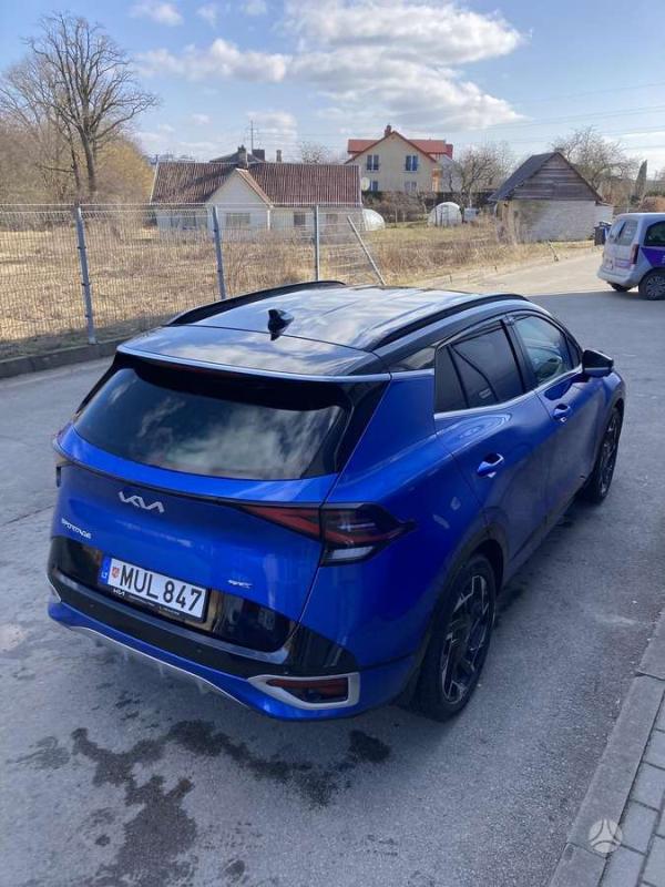 Blue Kia Sportage 2024 in Vilnius, with an engine capacity of 1.60 L and mileage of 27 thousand km for 29700 €, photo 6 on AUTOMOTO.COM.LV
