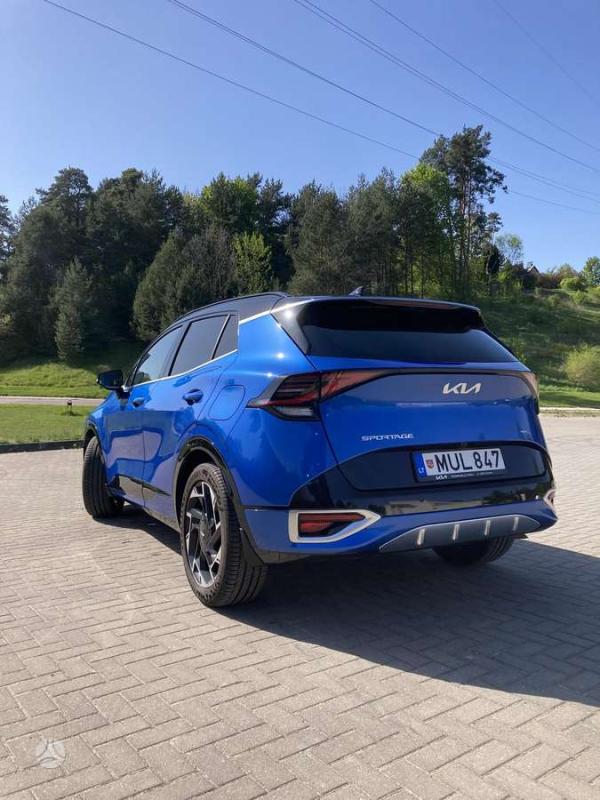 Blue Kia Sportage 2024 in Vilnius, with an engine capacity of 1.60 L and mileage of 27 thousand km for 29700 €, photo 11 on AUTOMOTO.COM.LV