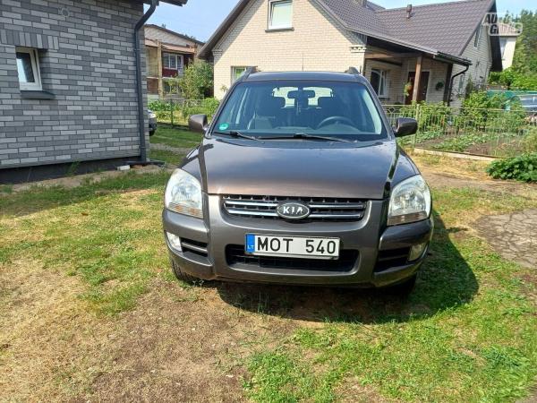 Brown Kia Sportage 2005 in Varena, with an engine capacity of 2.00 L and mileage of 230 thousand km for 2800 €, photo 6 on AUTOMOTO.COM.LV