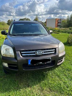 Brown Kia Sportage 2007 in Salcininkai, with an engine capacity of 1.99 L and mileage of 276 thousand km for 2790 €, photo  on AUTOMOTO.COM.LV