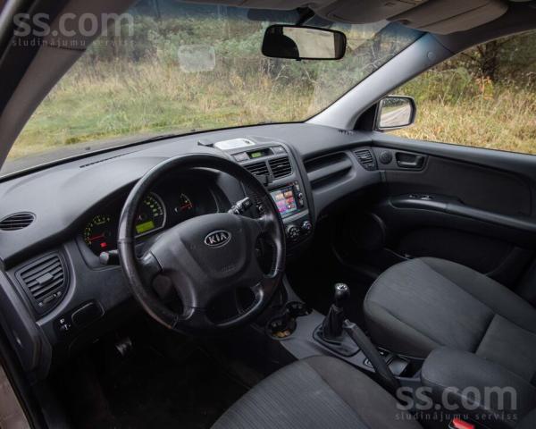 Brūns Kia Sportage 2009 Rīga, ar dzinēja tilpumu 2.00 L un nobraukumu 150 tūkst. km par 2500 €, foto 3 vietnē AUTOMOTO.COM.LV