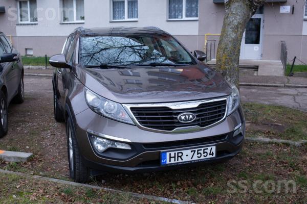Brown Kia Sportage 2011 in Liepaja, with an engine capacity of 1.60 L and mileage of 212 thousand km for 5300 €, photo 1 on AUTOMOTO.COM.LV