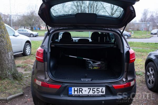 Brown Kia Sportage 2011 in Liepaja, with an engine capacity of 1.60 L and mileage of 212 thousand km for 5300 €, photo 4 on AUTOMOTO.COM.LV