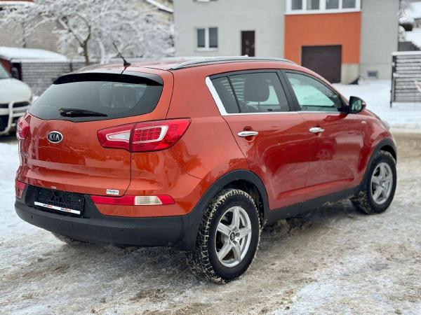 Brūns Kia Sportage 2011 Alīta, ar dzinēja tilpumu 2.00 L un nobraukumu 205 tūkst. km par 5980 €, foto 4 vietnē AUTOMOTO.COM.LV