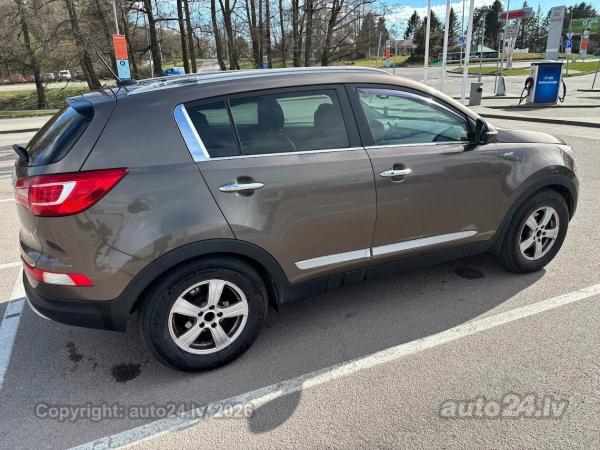 Brown Kia Sportage 2011 in Tallinn, with an engine capacity of 2.00 L and mileage of 124 thousand km for 3000 €, photo 3 on AUTOMOTO.COM.LV