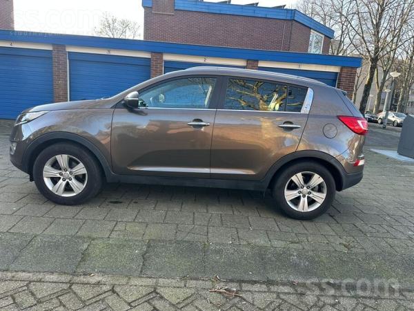 Brown Kia Sportage 2011 in Cesis, with an engine capacity of 2.00 L and mileage of 0 thousand km for 7950 €, photo 10 on AUTOMOTO.COM.LV
