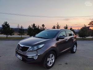 Brown Kia Sportage 2011 in Kaunas, with an engine capacity of 1.70 L and mileage of 203 thousand km for 6600 €, photo  on AUTOMOTO.COM.LV