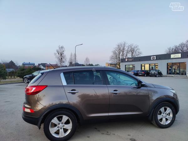 Brūns Kia Sportage 2011 Kauņa, ar dzinēja tilpumu 1.70 L un nobraukumu 203 tūkst. km par 6600 €, foto 6 vietnē AUTOMOTO.COM.LV